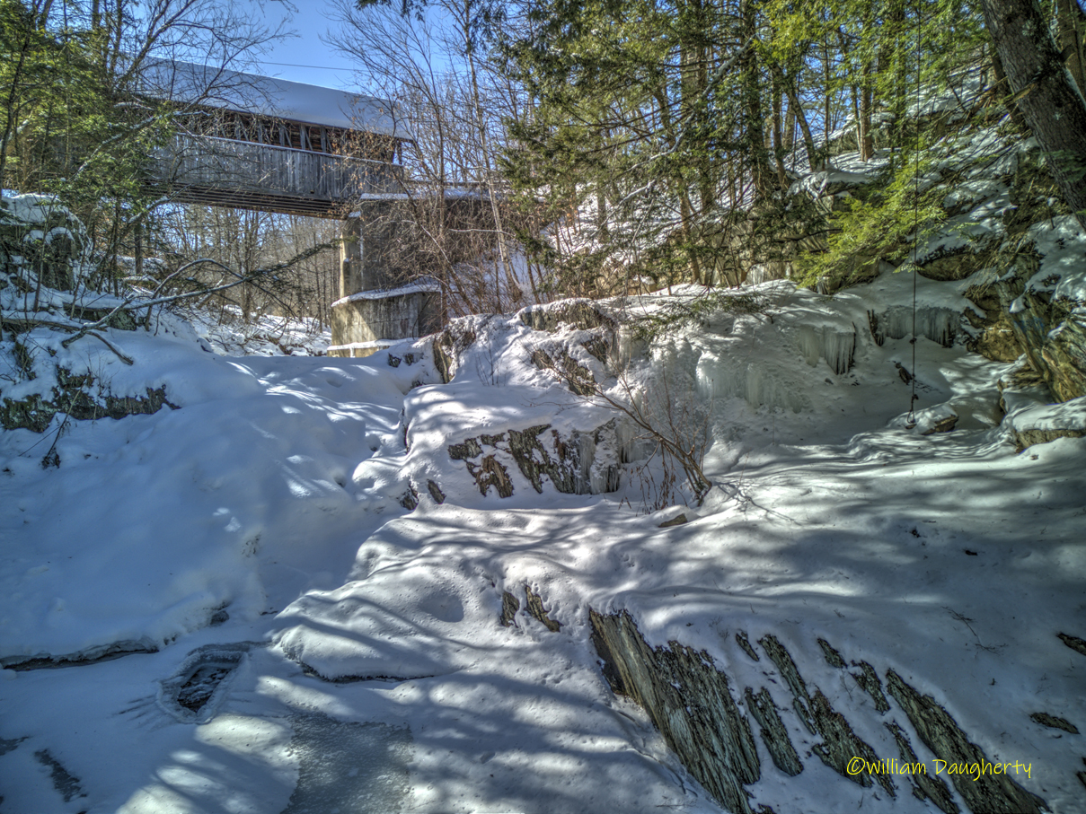 Meriden Covered Bridge over the frozen Blood's Brook. Plainfield, New ...
